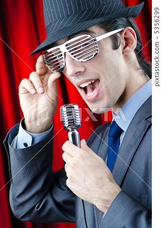 Man performing at the concert - Stock Photo [5356299] - PIXTA