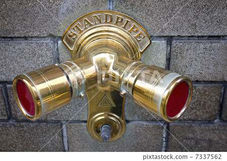 Fire hydrant installed on the building outer wall - Stock Photo ...