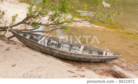 Small rowing boat on the shore of a small river - Stock Photo [9832972 ...