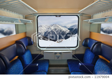 Interior of train and mountains in window - Stock Photo [11979004] - PIXTA