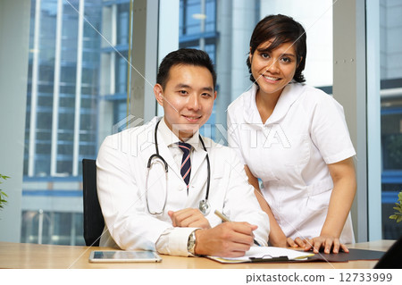 Stock Photo: Healthcare Professionals with Asian Male Chinese Doctor ...
