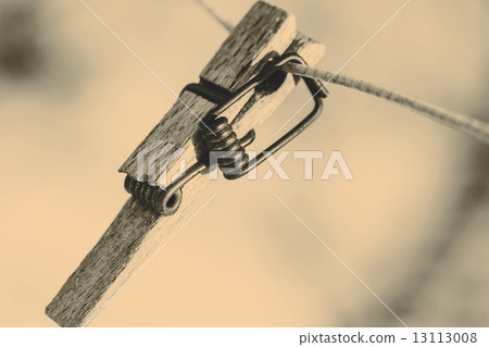 Stock Photo: Broken clothespin on the wire - Stock Image - Everypixel