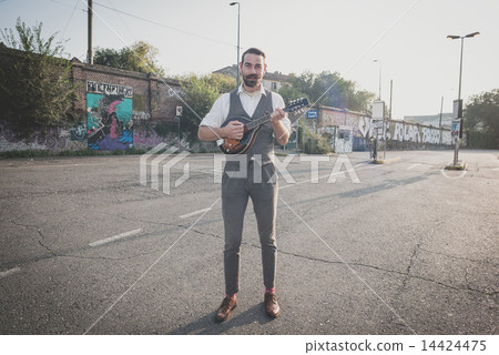 handsome big moustache hipster man playing... - Stock Photo [14424475 ...