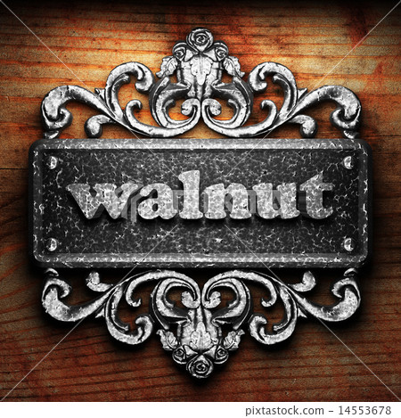 walnut word of iron on wooden background - Stock Illustration [14553678 ...