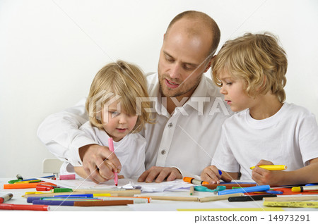 teaching to hold pen - Stock Photo [14973291] - PIXTA