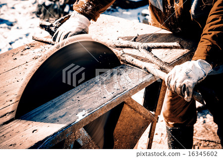 Stock Photo: Man working with circular saw blade - Stock Image - Everypixel