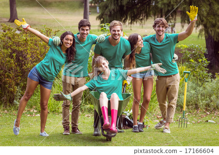 Happy friends gardening for the community - Stock Photo [17166604] - PIXTA
