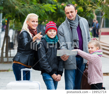 Family checking direction in map - Stock Photo [19952714] - PIXTA