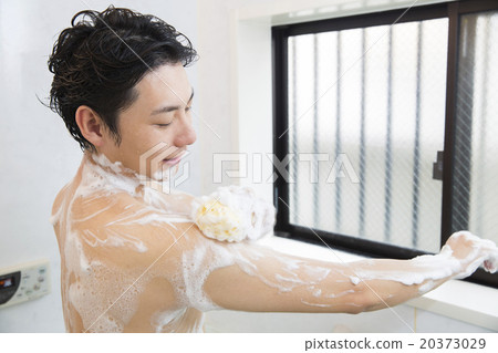 A young man washing his body - Stock Photo [20373029] - PIXTA