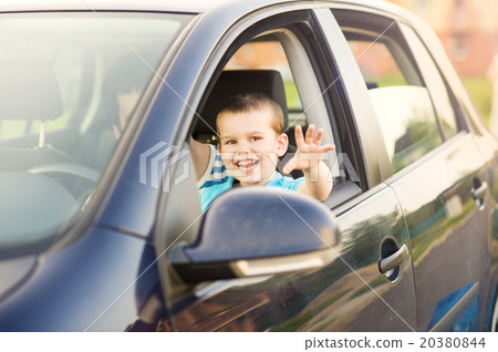 Stock Photo: Father and son driving car - Stock Image - Everypixel