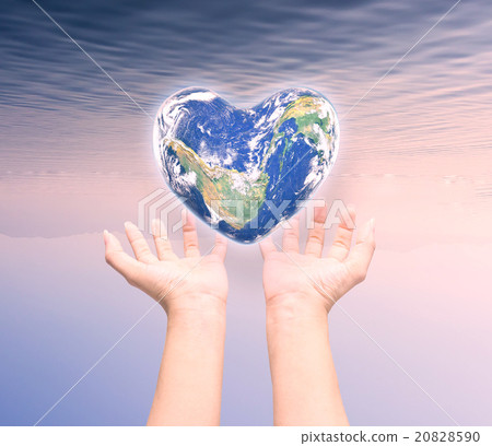 World in heart shape with over women human hands - Stock Photo ...