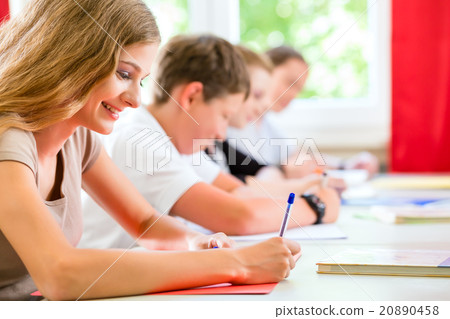 Students writing a test in school concentrating - Stock Photo [20890458 ...