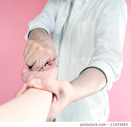 Men pulling arms by force - Stock Photo [21943663] - PIXTA