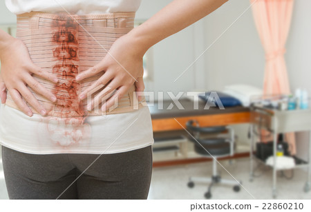 Woman in back pain from spinal injury - Stock Photo [22860210] - PIXTA