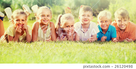 kids lying on green grass - Stock Photo [26120498] - PIXTA