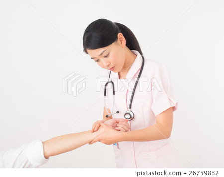 Nurse Taking Pulse