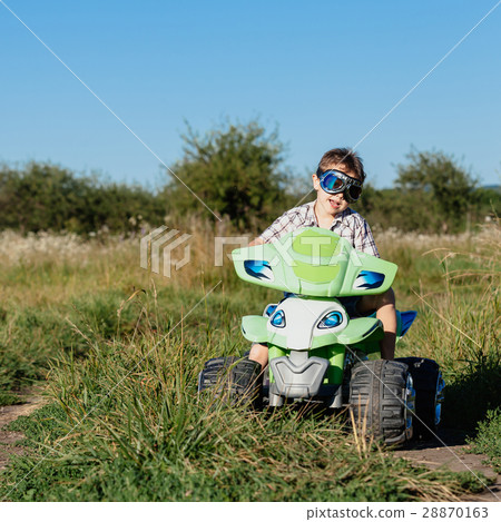 Happy little boy playing on road at the day time. - Stock Photo ...