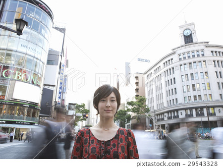 Young women in the street corners - Stock Photo [29543328] - PIXTA