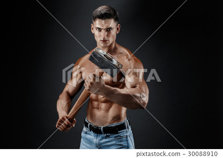 Muscular man with naked torso holding big hummer - Stock Photo ...