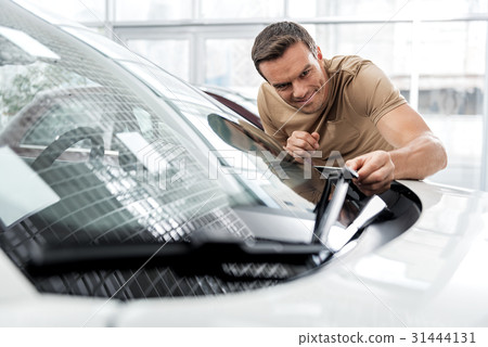 Outgoing man standing near automobile - Stock Photo [31444131] - PIXTA