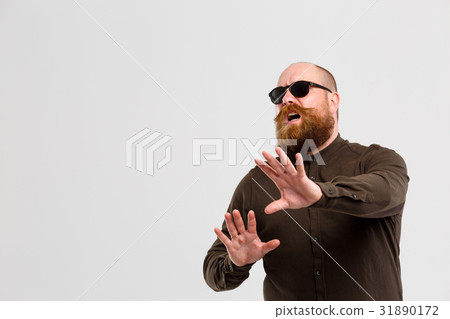 Blind man with ginger beard - Stock Photo [31890172] - PIXTA