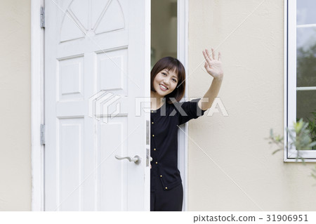 Japanese lady waving hands - Stock Photo [31906951] - PIXTA
