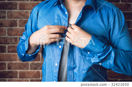 changing clothes, getting dressed, shirt - Stock Photo [32421650] - PIXTA
