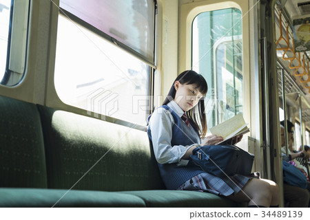 High school girl attending school train - Stock Photo [34489139] - PIXTA