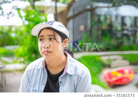 unhappy portrait cute innocent asian teen boring - Stock Photo ...