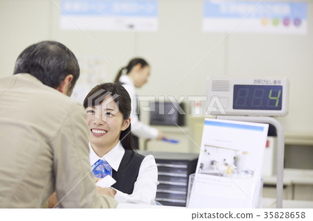 Bank clerk - Stock Photo [35828658] - PIXTA