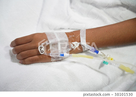 woman hand receiving saline solution in a hospital - Stock Photo ...