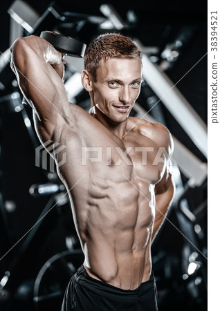 Handsome model young man training arms in gym - Stock Photo [38394521 ...