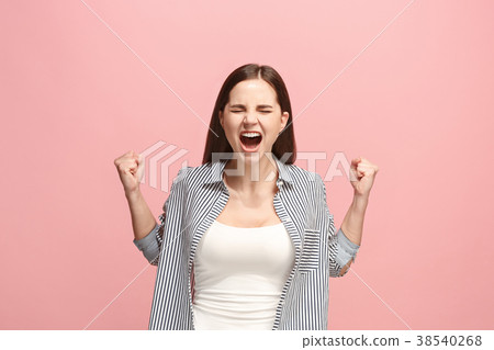 The young emotional angry woman screaming on pink - Stock Photo ...