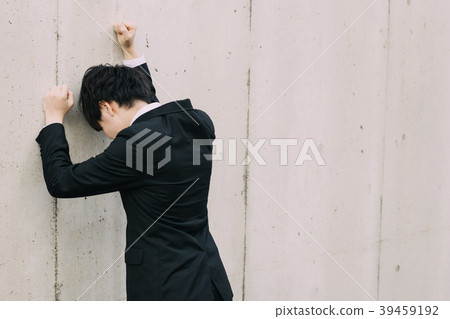 Sad young businessman Japanese male - Stock Photo [39459192] - PIXTA