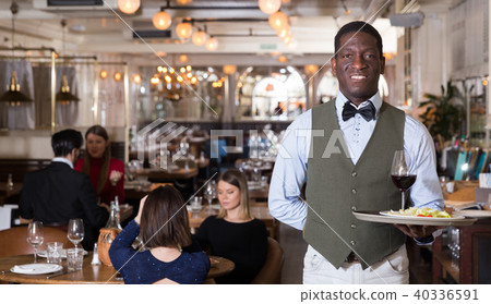 African American waiter with serving tray - Stock Photo [40336591] - PIXTA