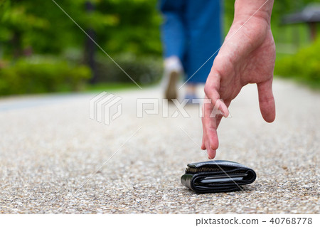Pick up a wallet image - Stock Photo [40768778] - PIXTA