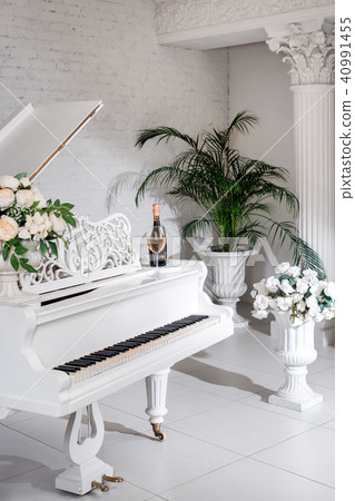 Grand piano in a luxury white classic interior - Stock Image - Everypixel