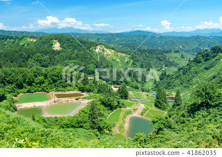Terraced rice fields and terrace ponds of early... - Stock Photo ...