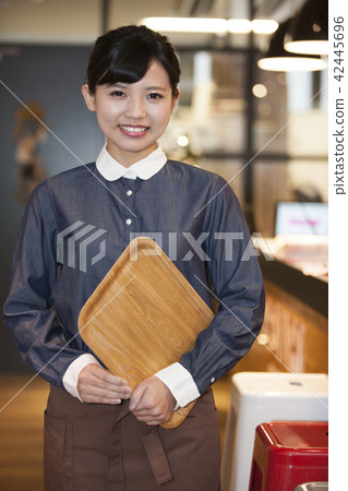 Smiling female staff - Stock Photo [42445696] - PIXTA