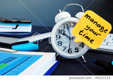 Manage your time. Alarm clock and memo stick. - Stock Photo [44323114 ...
