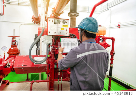 Engineer checking generator fire control system - Stock Photo [45148913 ...