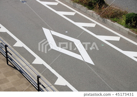 Diamond mark drawn on the road surface. Road... - Stock Photo [45173431 ...