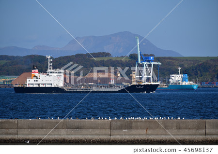 Taking a picture of the view of a cargo ship... - Stock Photo [45698137 ...