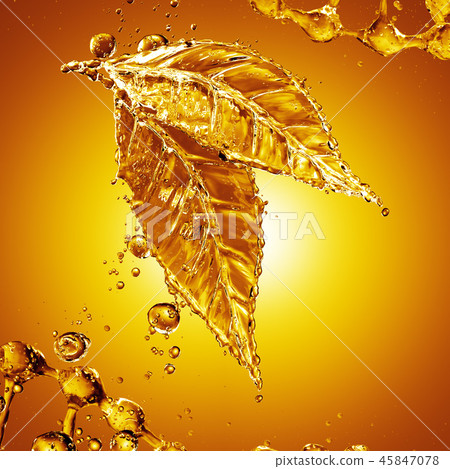 Leaf made of oil splash on gold background - Stock Illustration ...