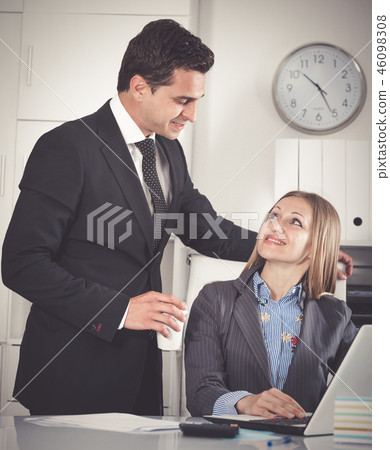 Adult business couple flirting in office - Stock Photo [46098308] - PIXTA