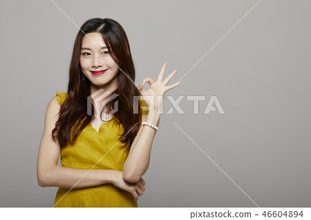 Woman portrait series color back hand sign - Stock Photo [46604894] - PIXTA