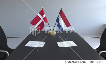 Flags of Denmark and Netherlands and papers on... - Stock Illustration ...