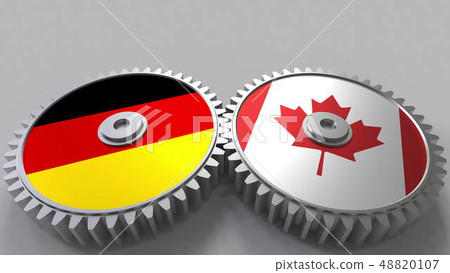 Flags of Germany and Canada on meshing gears.... - Stock Illustration ...