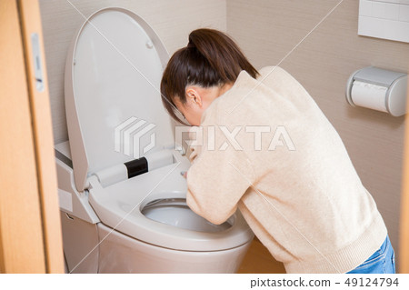 Woman vomiting in the bathroom - Stock Photo [49124794] - PIXTA