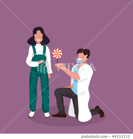man doctor pediatrician giving lollipop to... - Stock Illustration ...